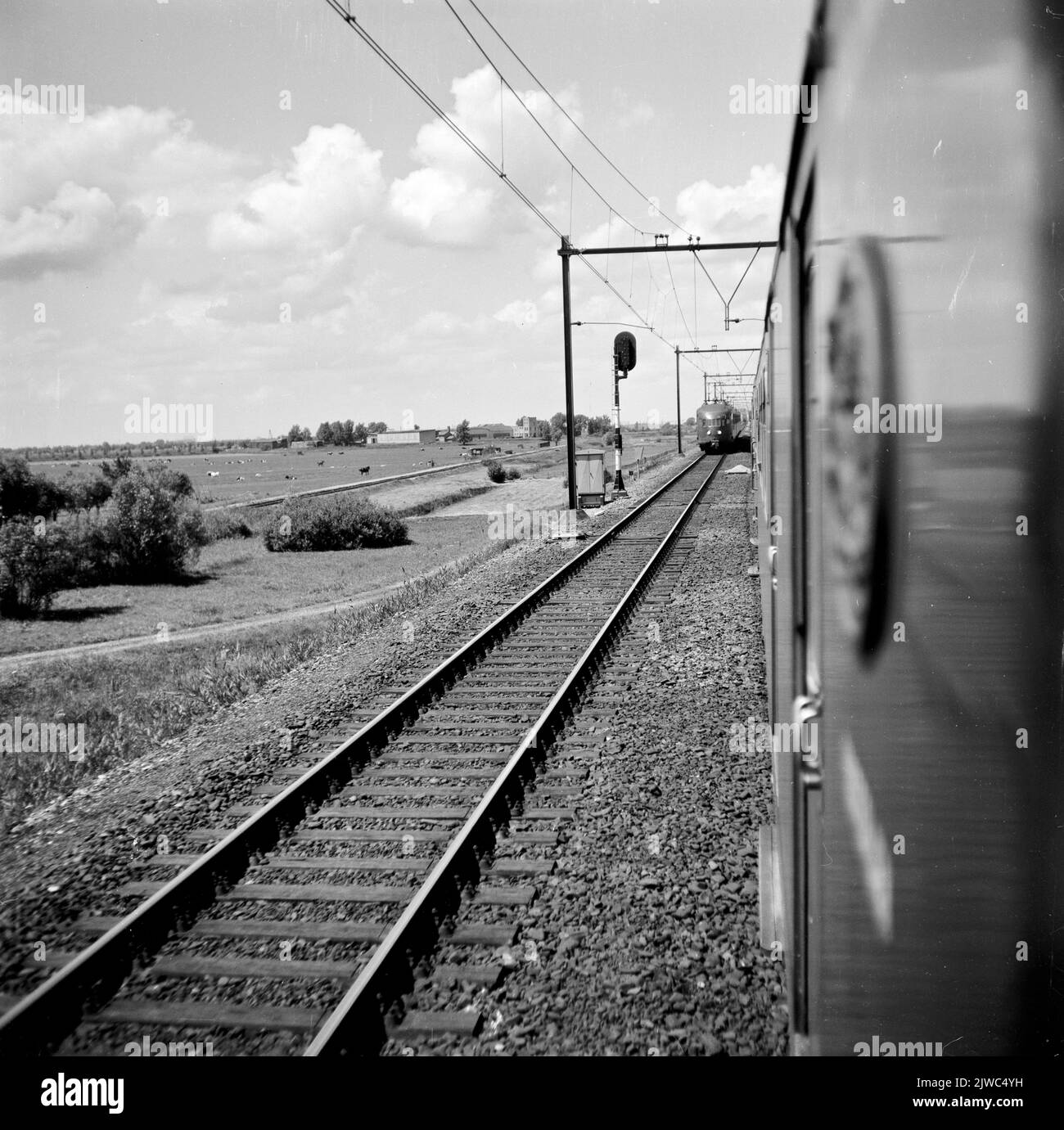 Face from a moving train on the railway (Utrecht-Gouda?) With an ...