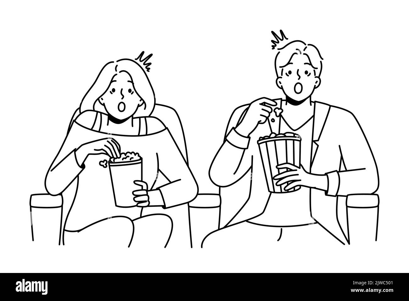 Couple eat popcorn enjoy movie in cinema. Emotional man and woman feel ...