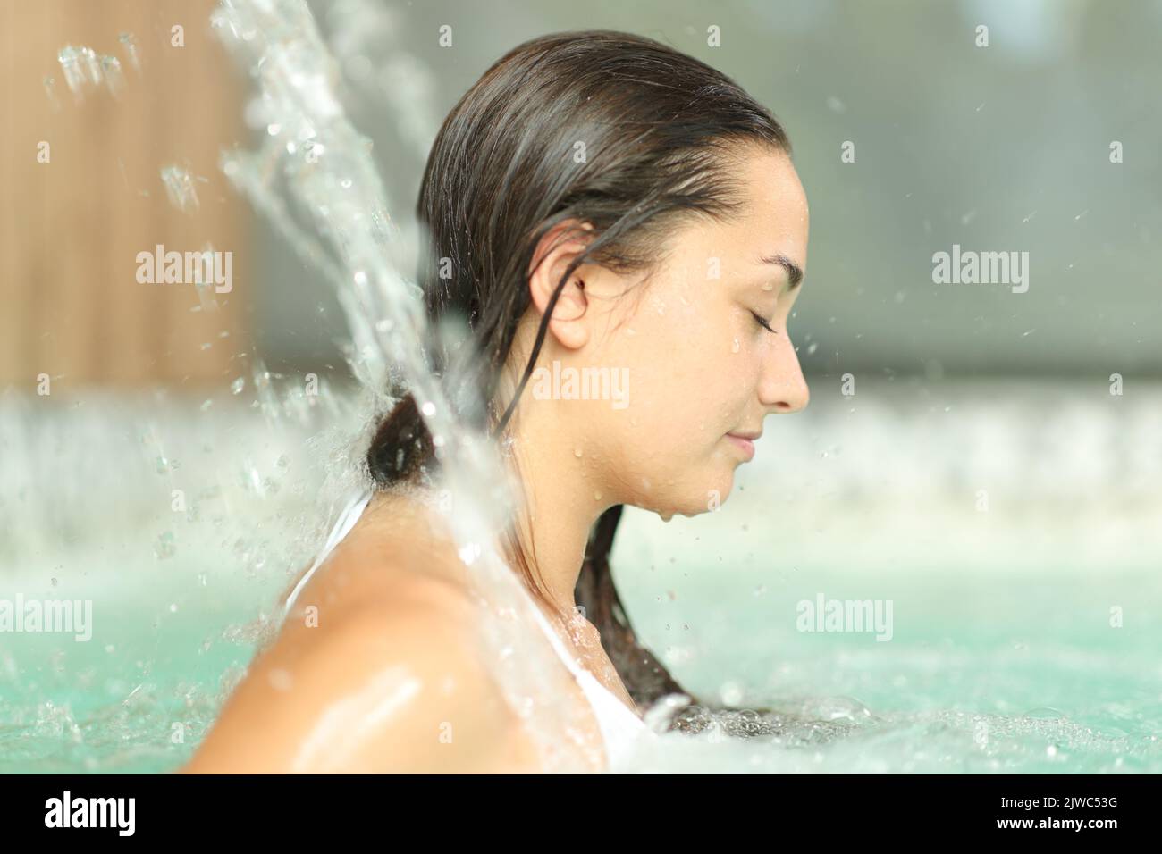 Beautiful woman enjoying jet water hi-res stock photography and images ...