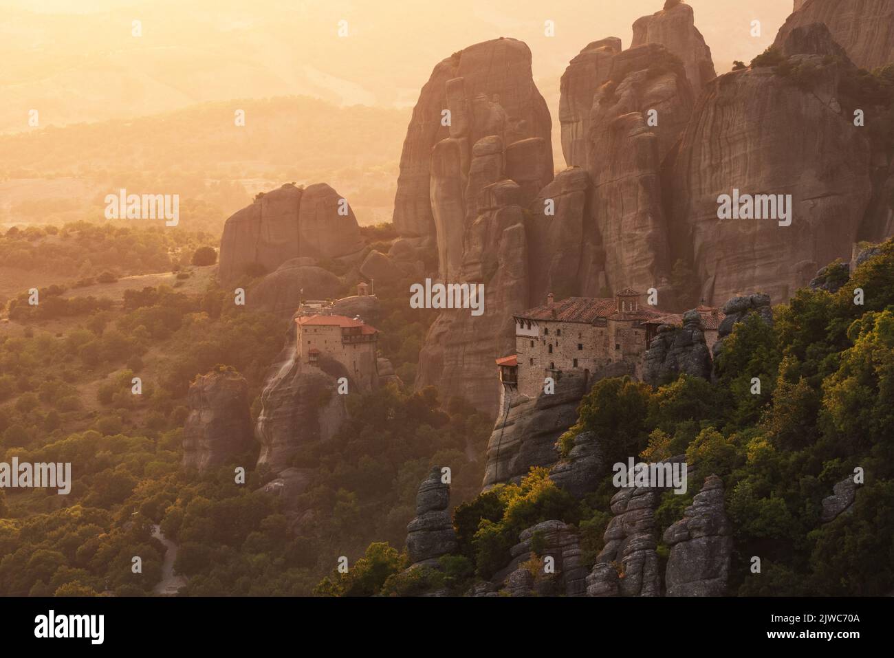 Beautiful sunset landscape with amazing old monasteries of Meteora ...