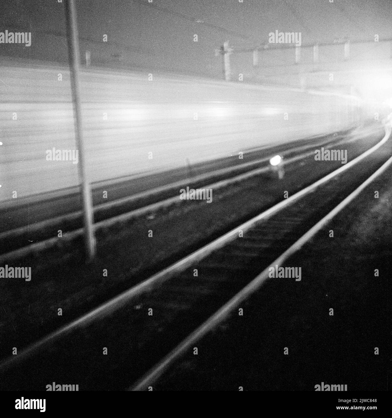 Image of a front ice -nailing electric train at evening Stock Photo - Alamy
