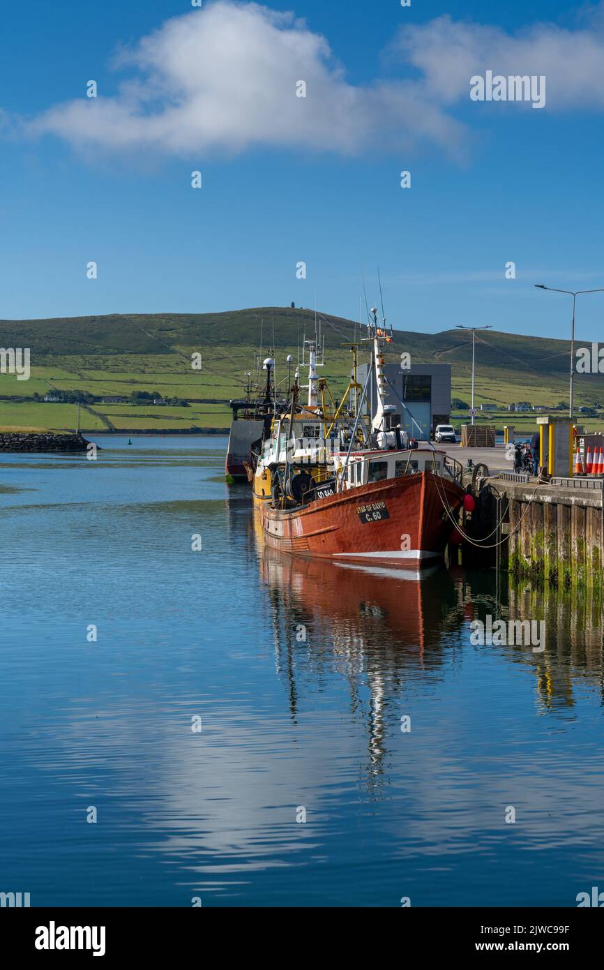 Dingle, Ireland - 7 August, 2022: red fishing boat on the docks of ...