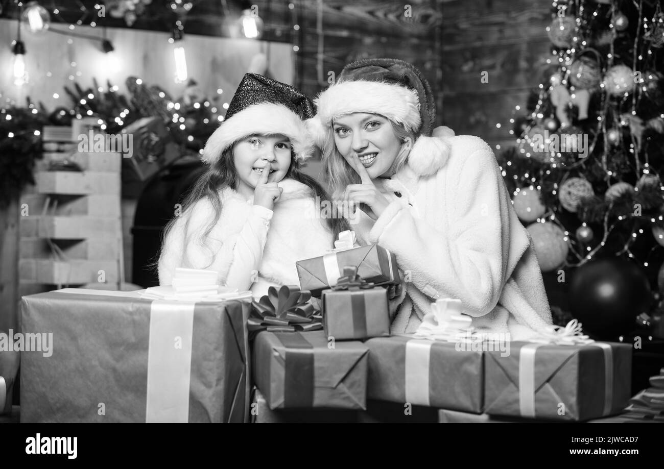 New year tradition. Boxing day. Wrapped gifts near christmas tree ...