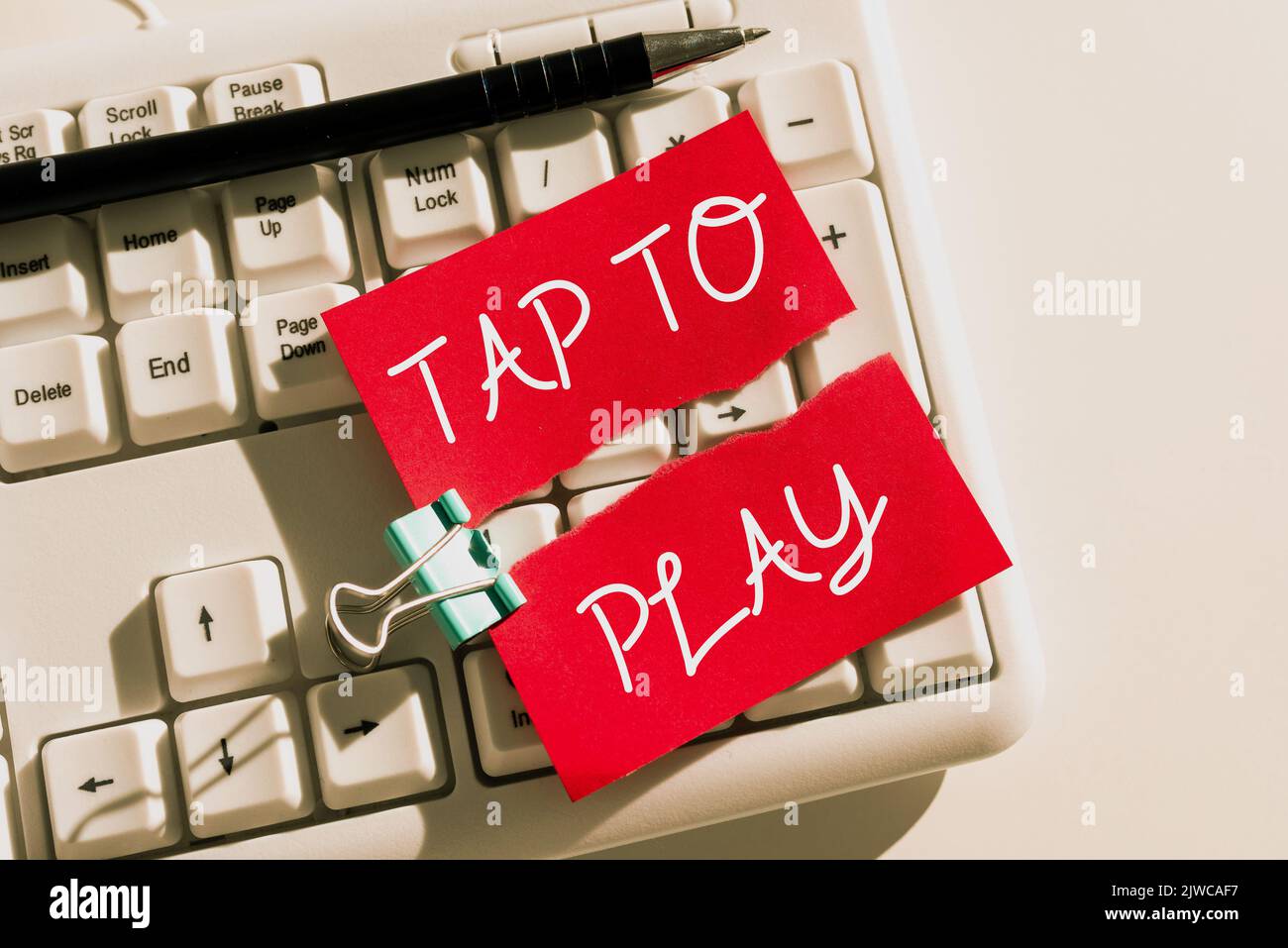Conceptual caption Tap To Play. Concept meaning Touch the screen to ...