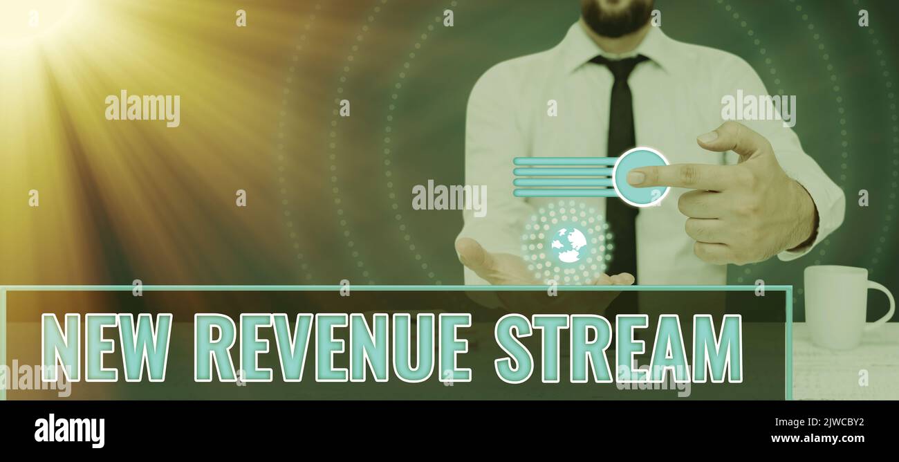 Hand writing sign New Revenue StreamAdditional Enhanced Source of ...