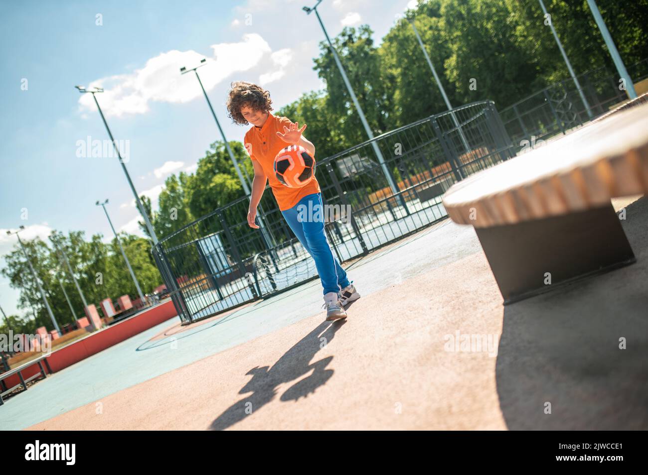 Adolescent boy practicing his dribbling skills outside Stock Photo - Alamy