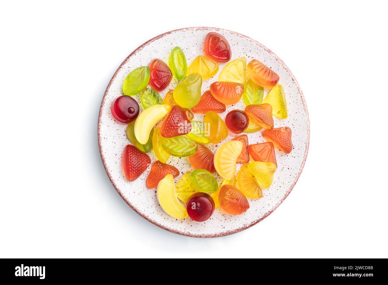 Various fruit jelly candies on plate isolated on white background. top ...