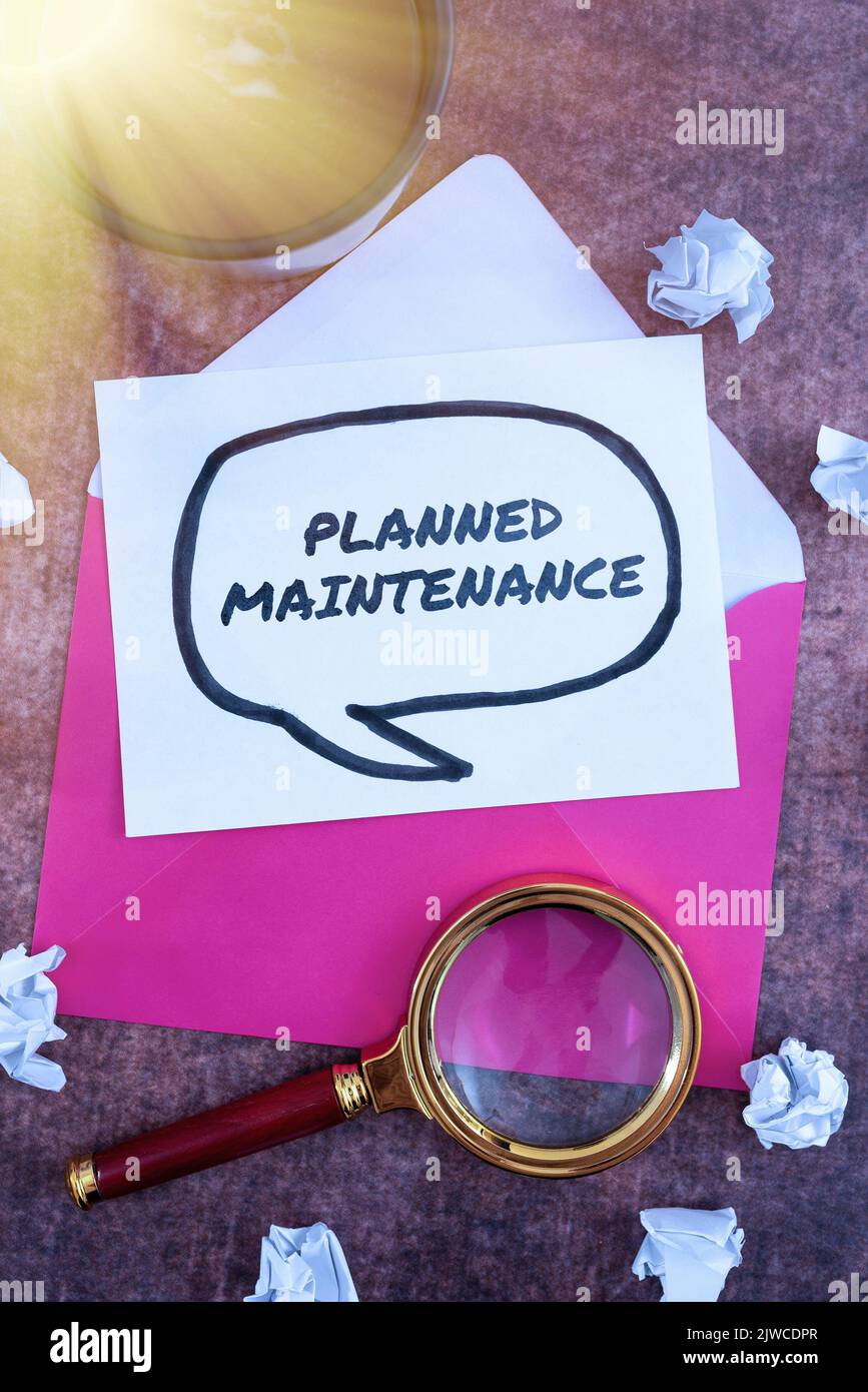 Hand writing sign Planned Maintenance. Word Written on Check ups to be ...
