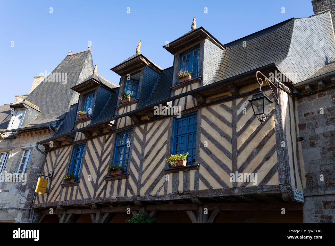 Half-timbered medieval builing at inner city Becherel, Brittany, France ...