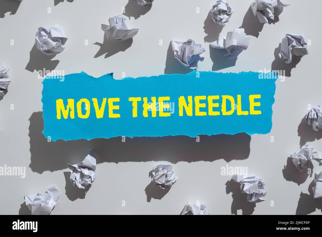Text sign showing Move The NeedleMake a noticeable difference in ...