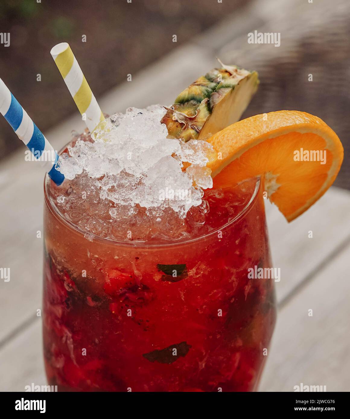 tropical cocktail of alcohol and natural juices Stock Photo - Alamy