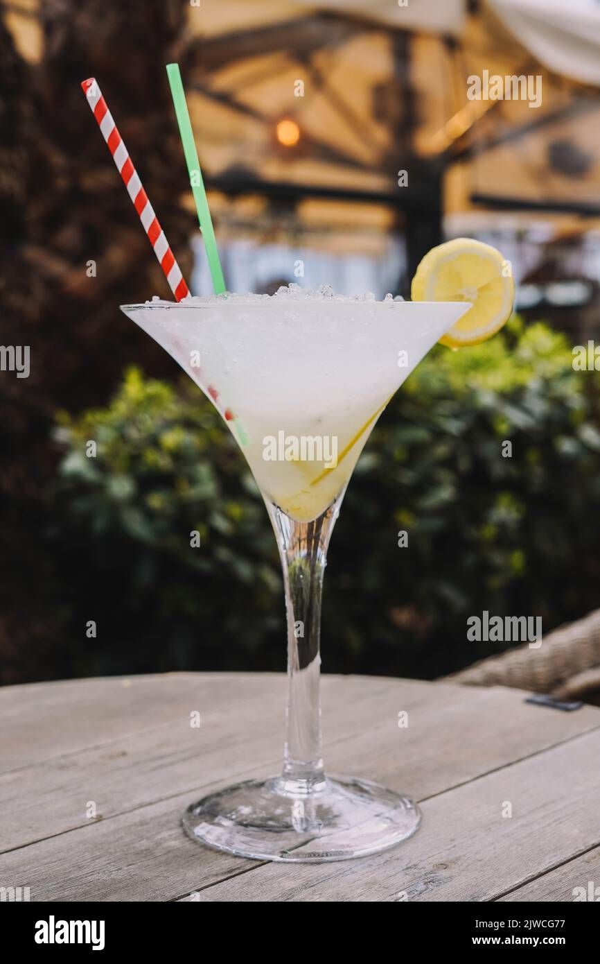 tropical cocktail of alcohol and natural juices Stock Photo - Alamy