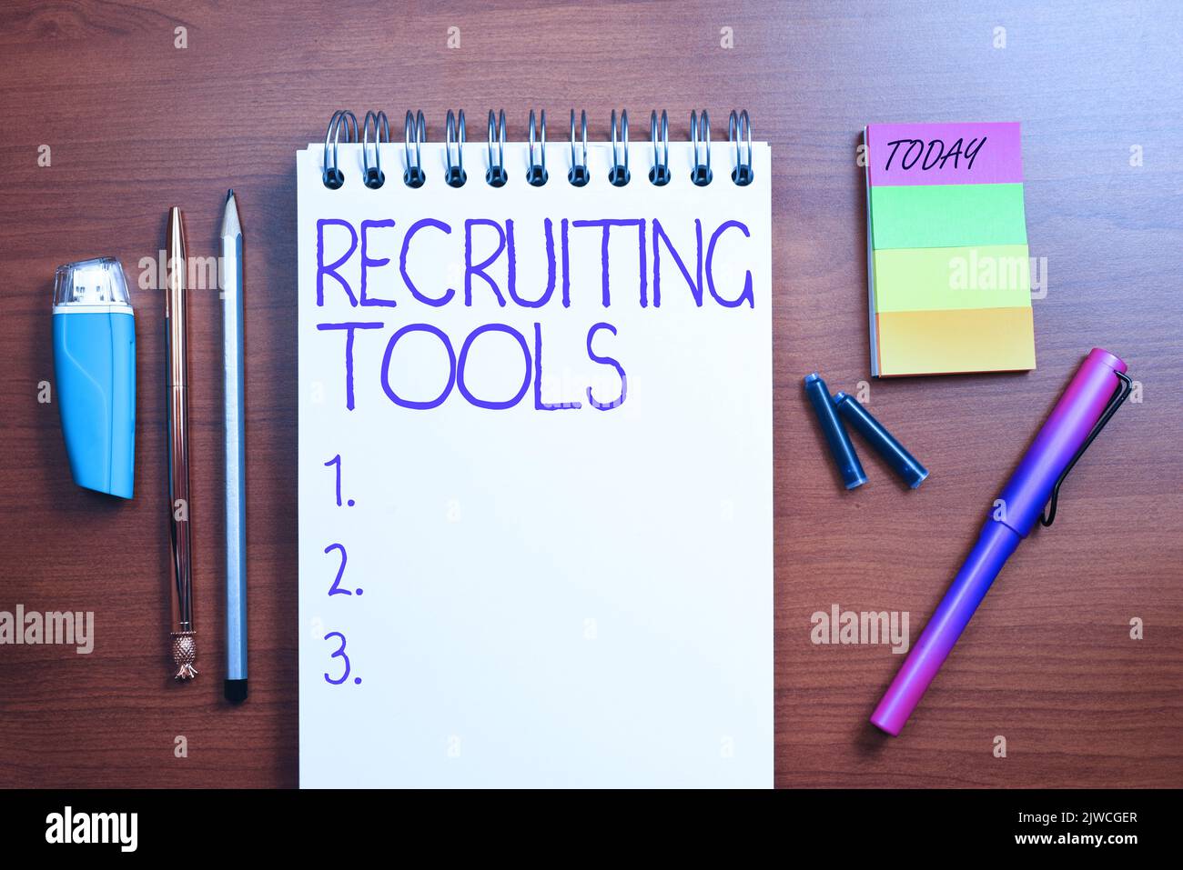 Hand writing sign Recruiting Toolsgetting new talents to your company ...