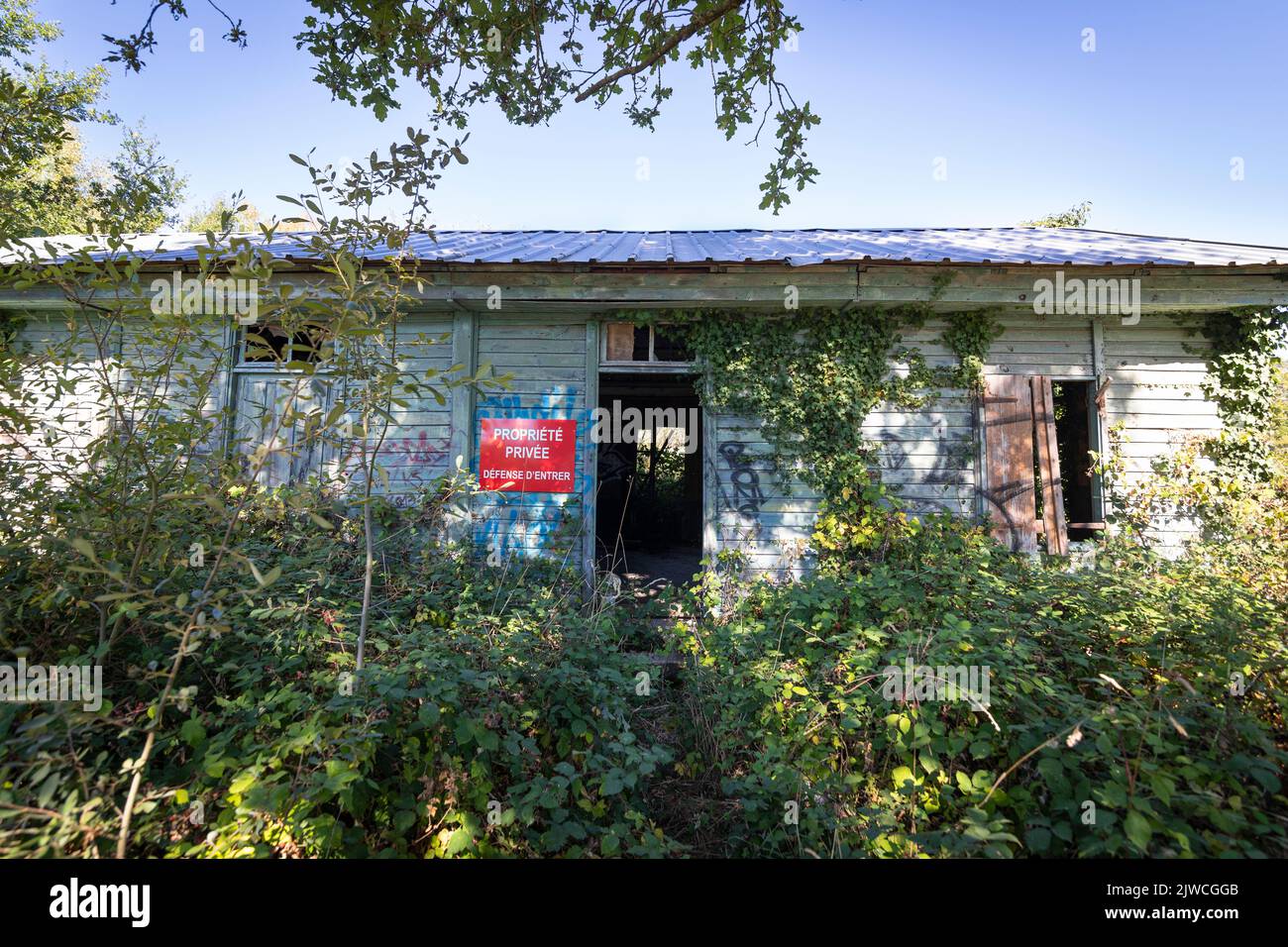 Forbidden entry sign at abandoned buildings in Brittany, France Stock ...