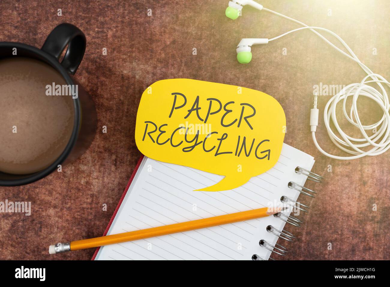Text sign showing Paper RecyclingUsing the waste papers in a new way by ...