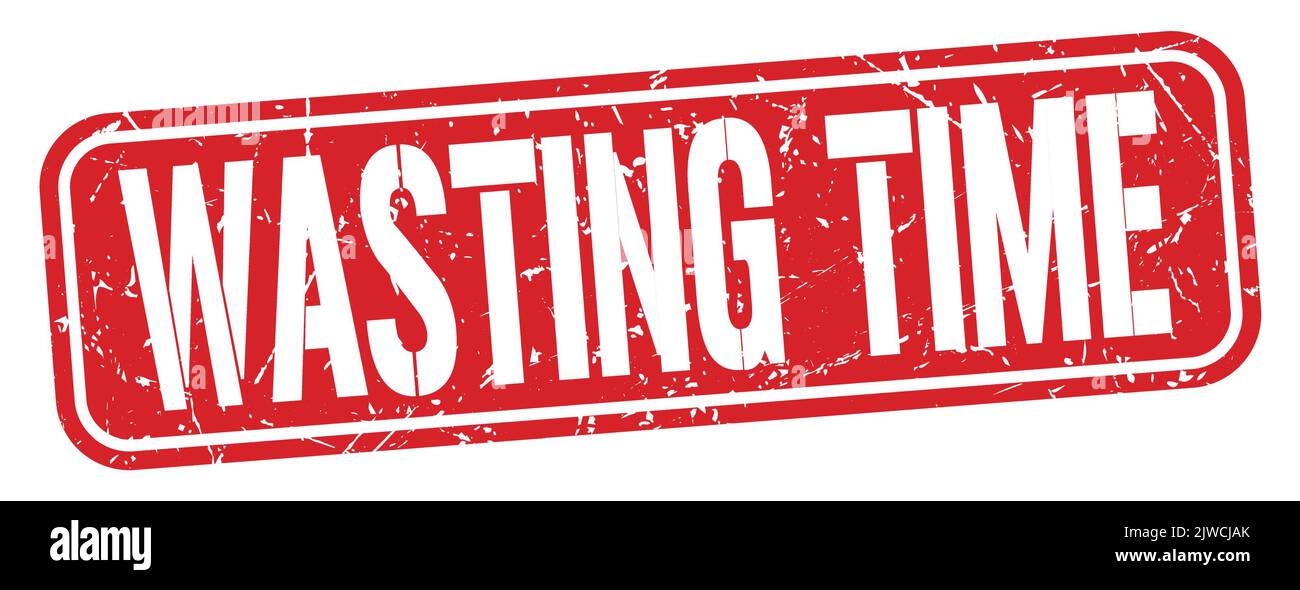 WASTING TIME text written on red grungy stamp sign Stock Photo - Alamy