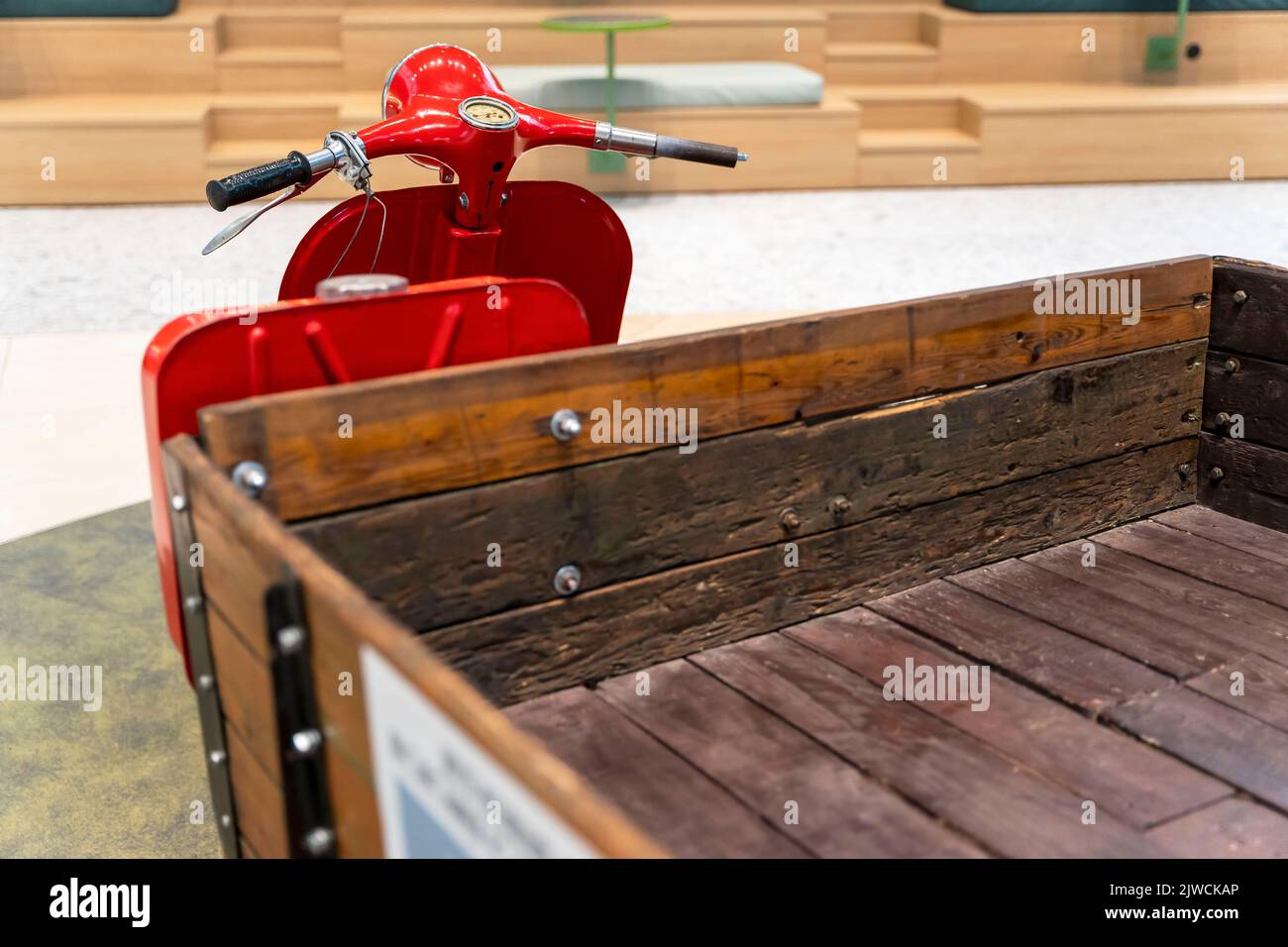 vintage old three-wheeled cargo scooter with wooden body Stock Photo ...