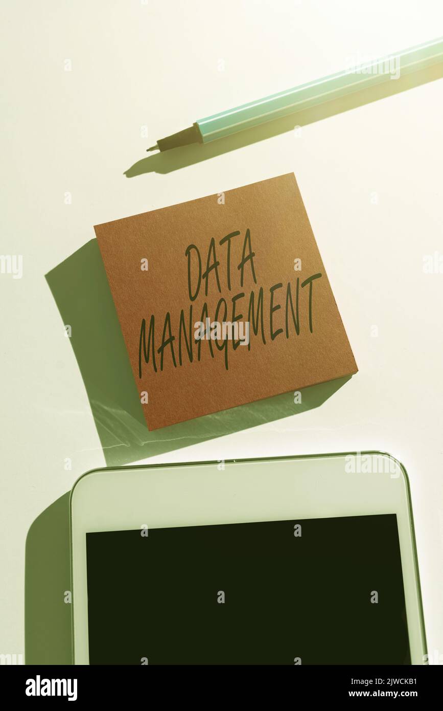 Sign displaying Data ManagementThe practice of organizing and maintaining data processes. Word ...
