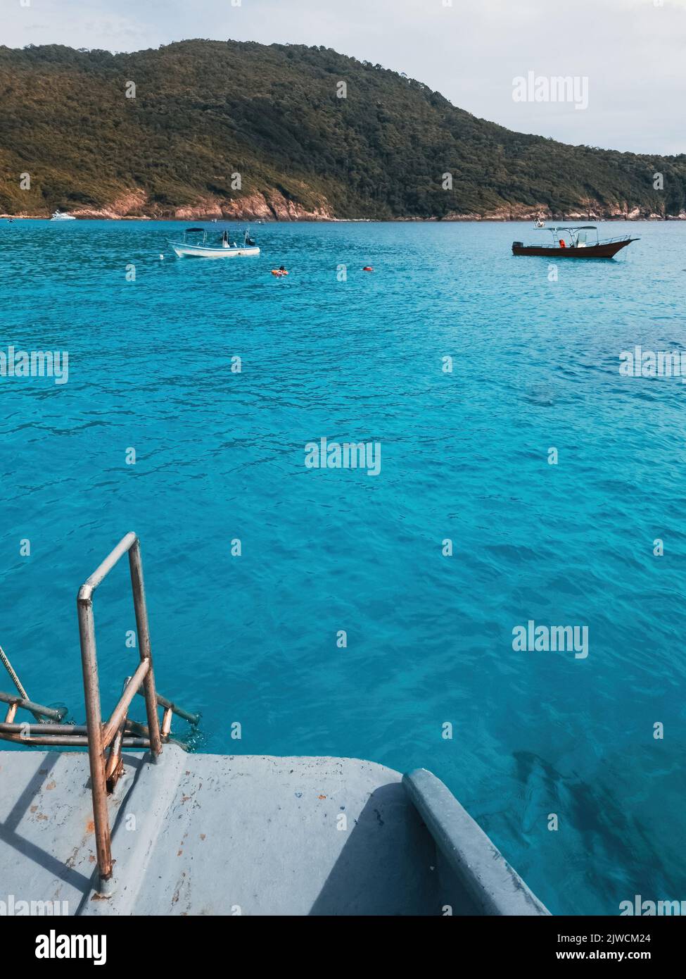 Boats, turquoise water and white sand beach, Redang Island, Malaysia ...