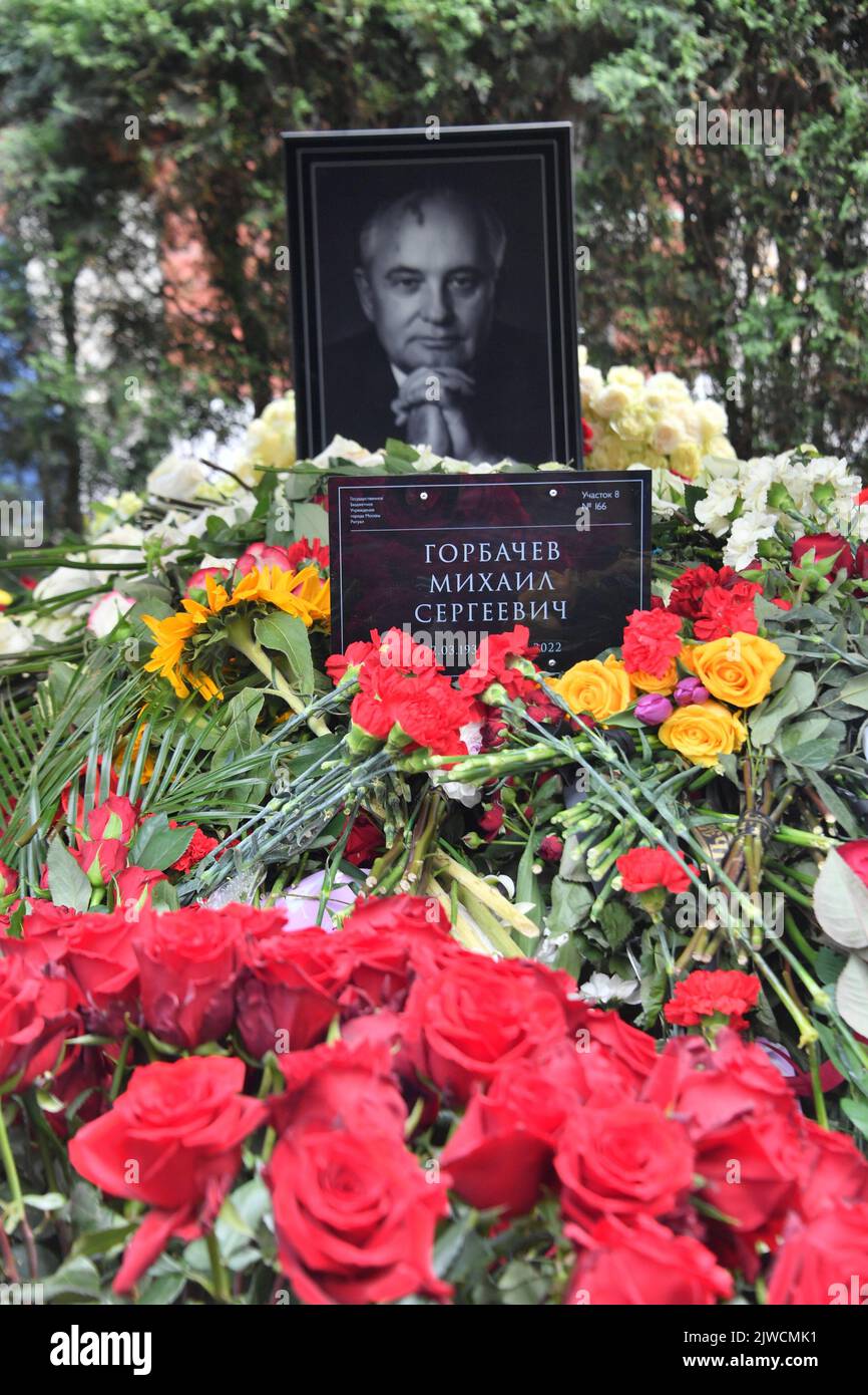 Moscow. Flowers and a portrait on a tomb of the former president of the ...