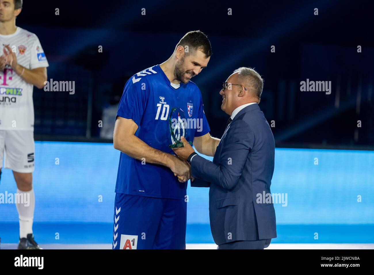 Zadar, Croatia. 04th Sep, 2022. Jakov Gojun of PPD Zagreb recieves ...