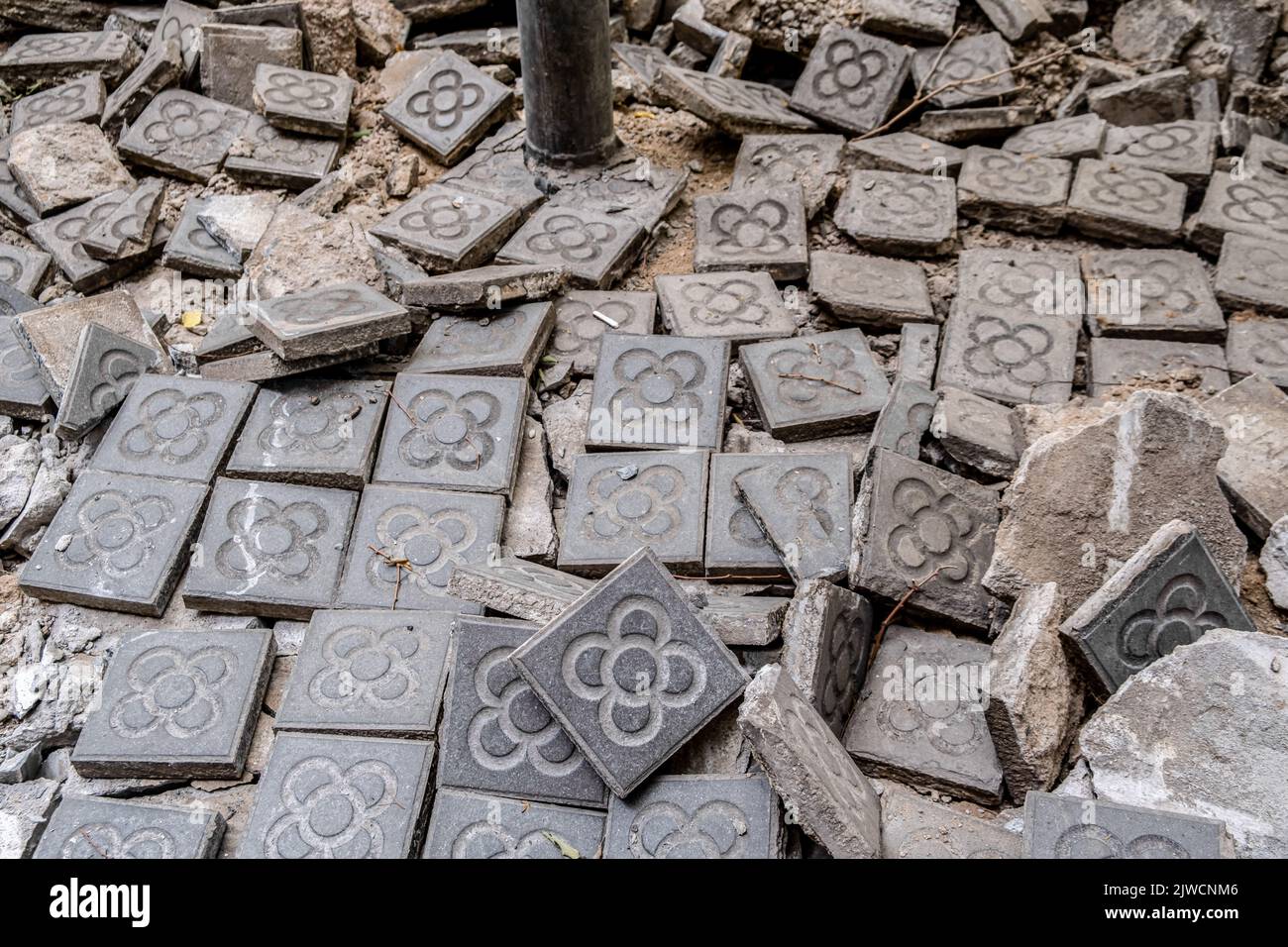 Traditional tiles that pave the streets of Barcelona known as "panot de ...