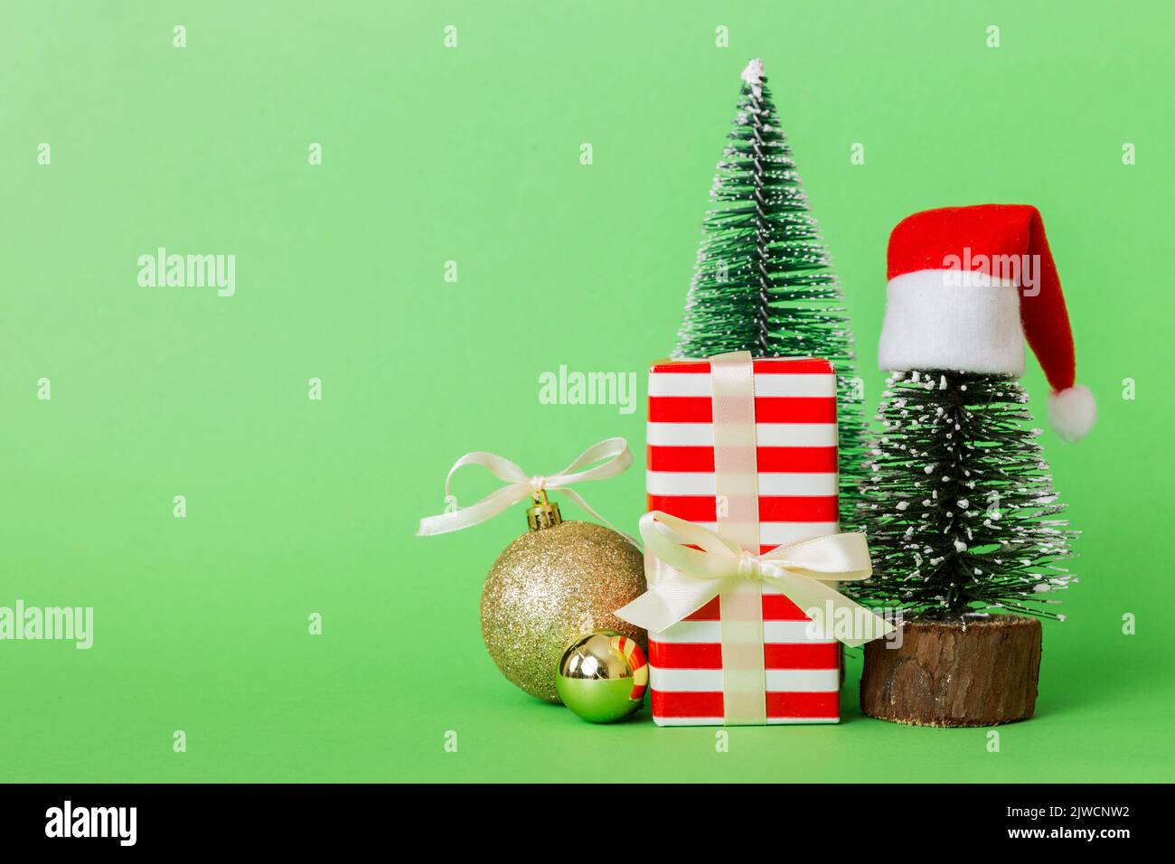 Christmas composition. craft Gift box, small tree, branches and craft ...