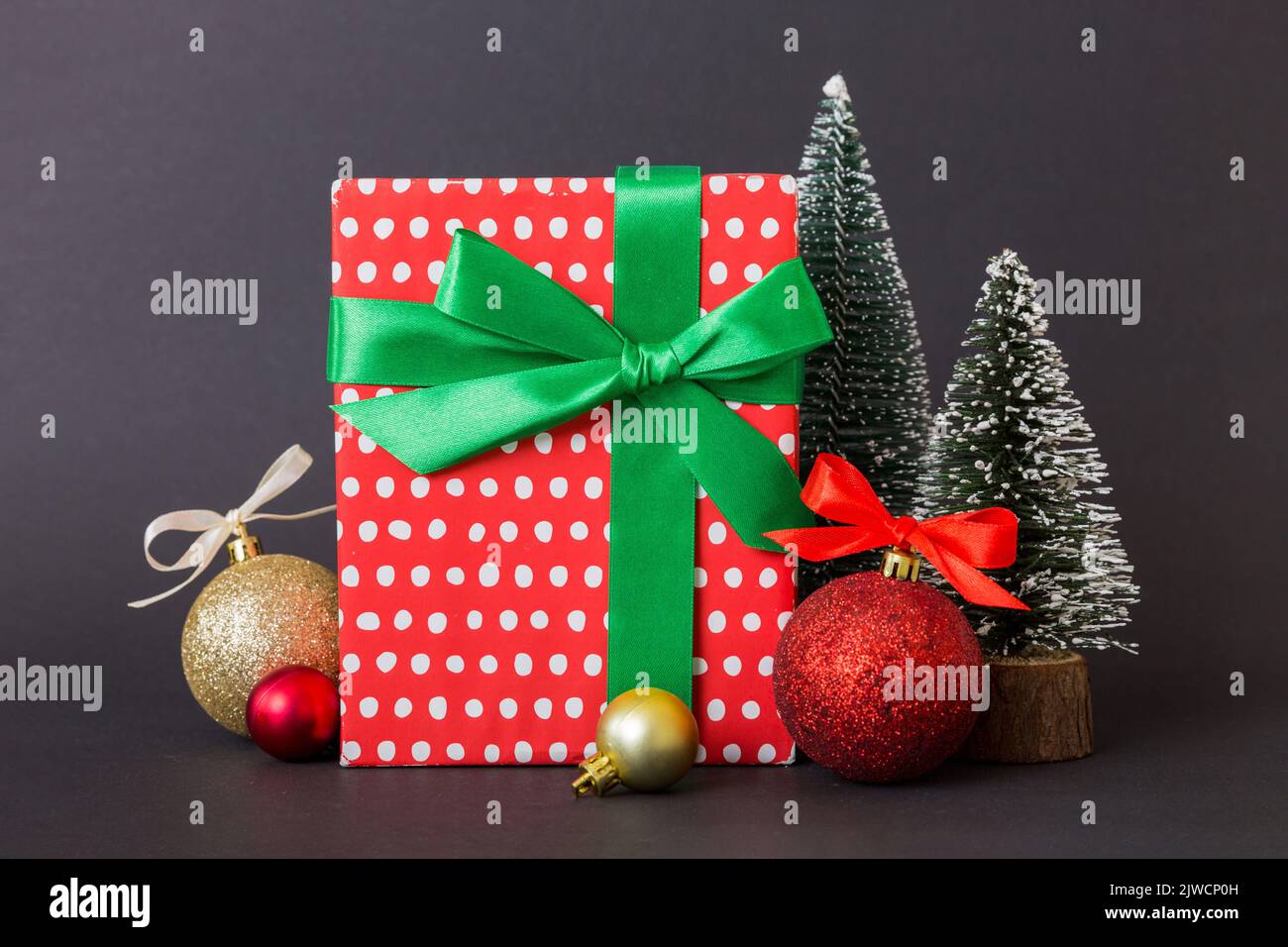 Christmas composition. craft Gift box, small tree, branches and craft ...