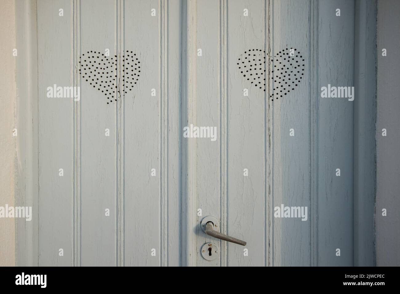 Heart shape in wooden door hi-res stock photography and images - Alamy