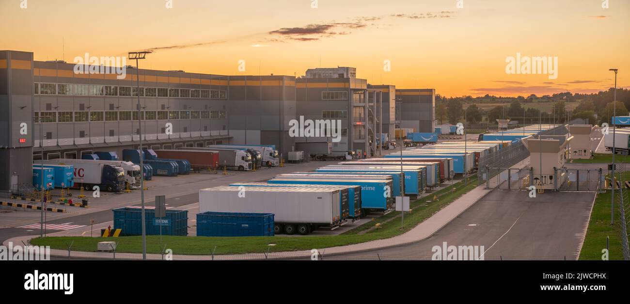 Amazon logistics centre during sunset Stock Photo - Alamy
