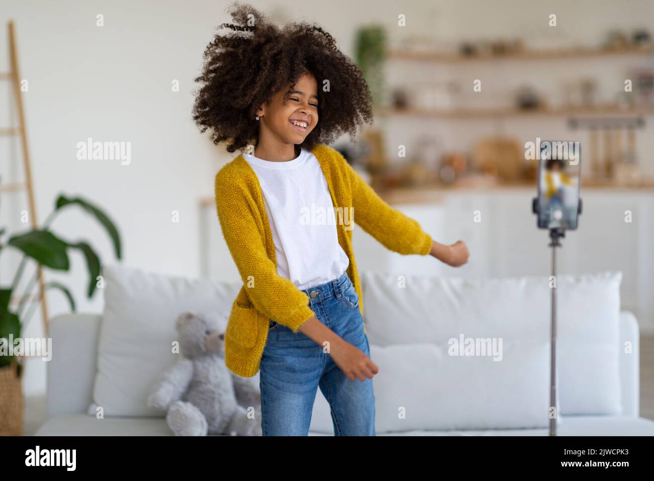 Emotional talented african american girl broadcasting from home Stock ...