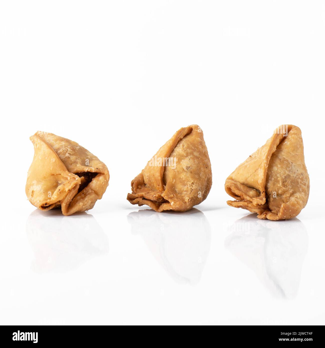 Samsa or samosas on white background. A Traditional Indian food Stock ...
