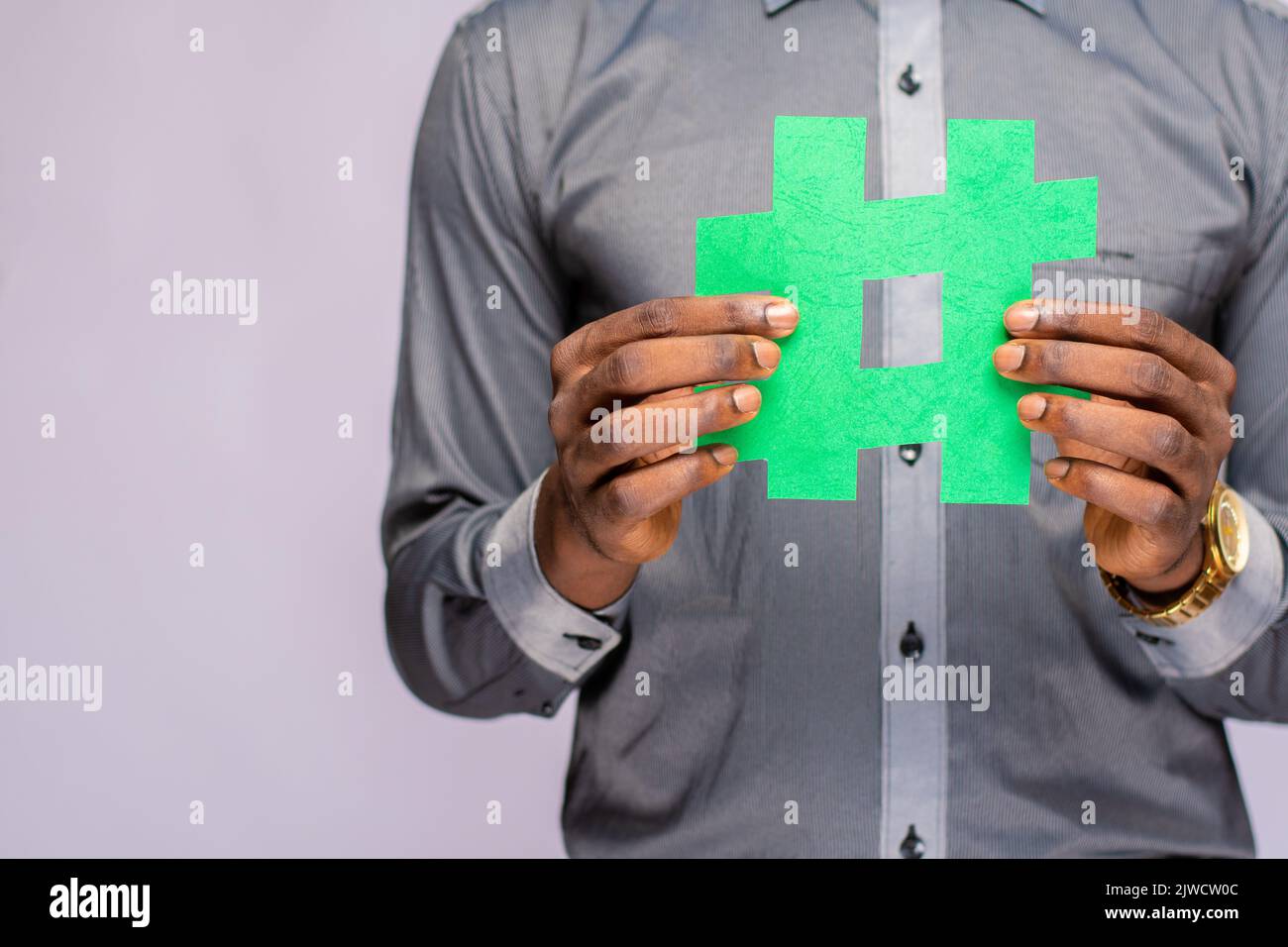 Nigerian man holding sign hi-res stock photography and images - Alamy