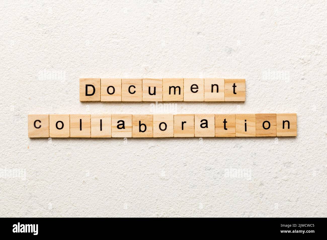 Document Collaboration word written on wood block. Document ...