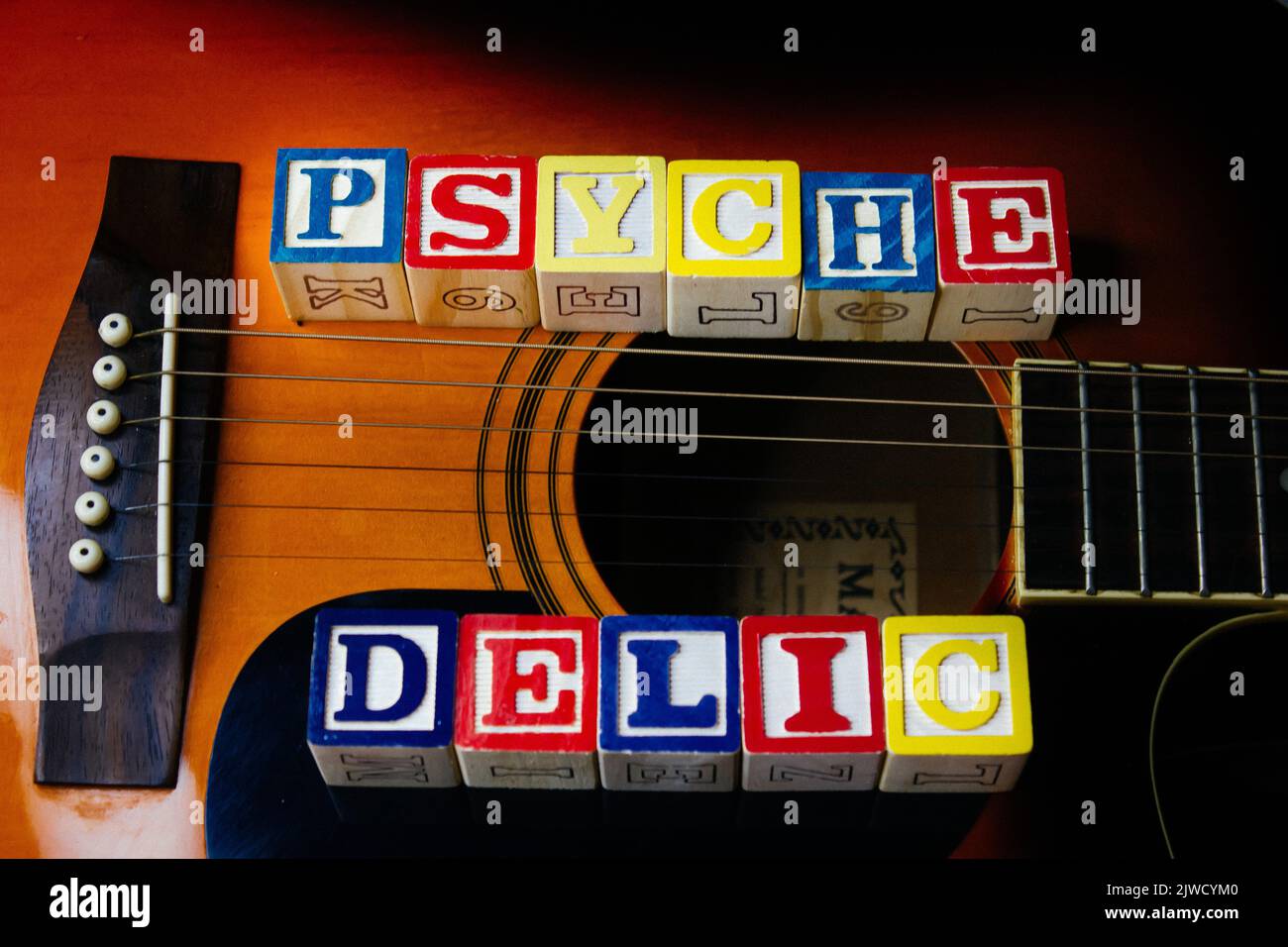 Word or phrase Psychedelic made with the letter cubes, standing on a ...