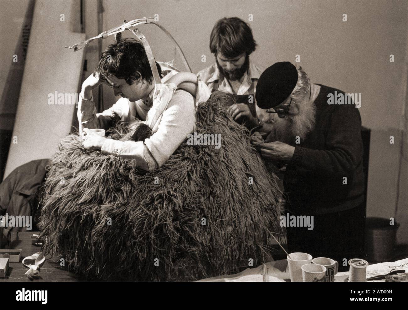 Legendary puppet builder, Kermit Love.and students or interns, help ...