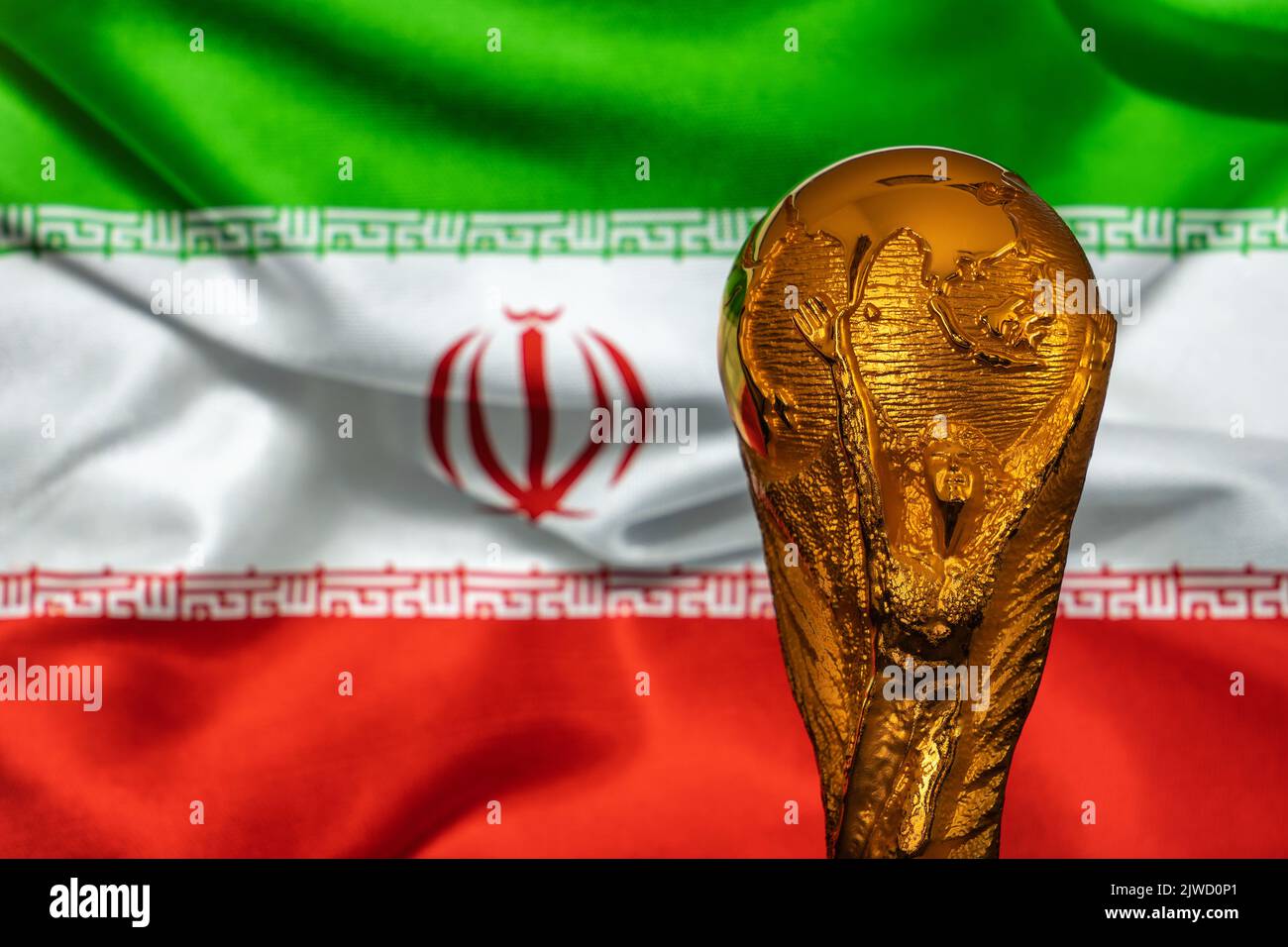 Doha, Qatar - September 4, 2022: FIFA World Cup trophy against the ...