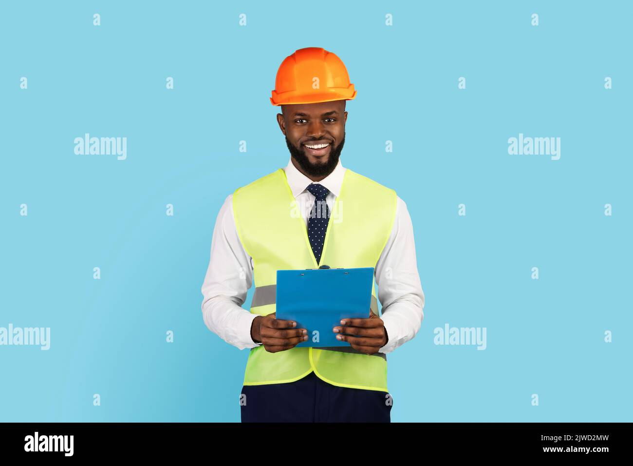 Professions Concept. Handsome Black Engineer In Hard Hat And Vest ...
