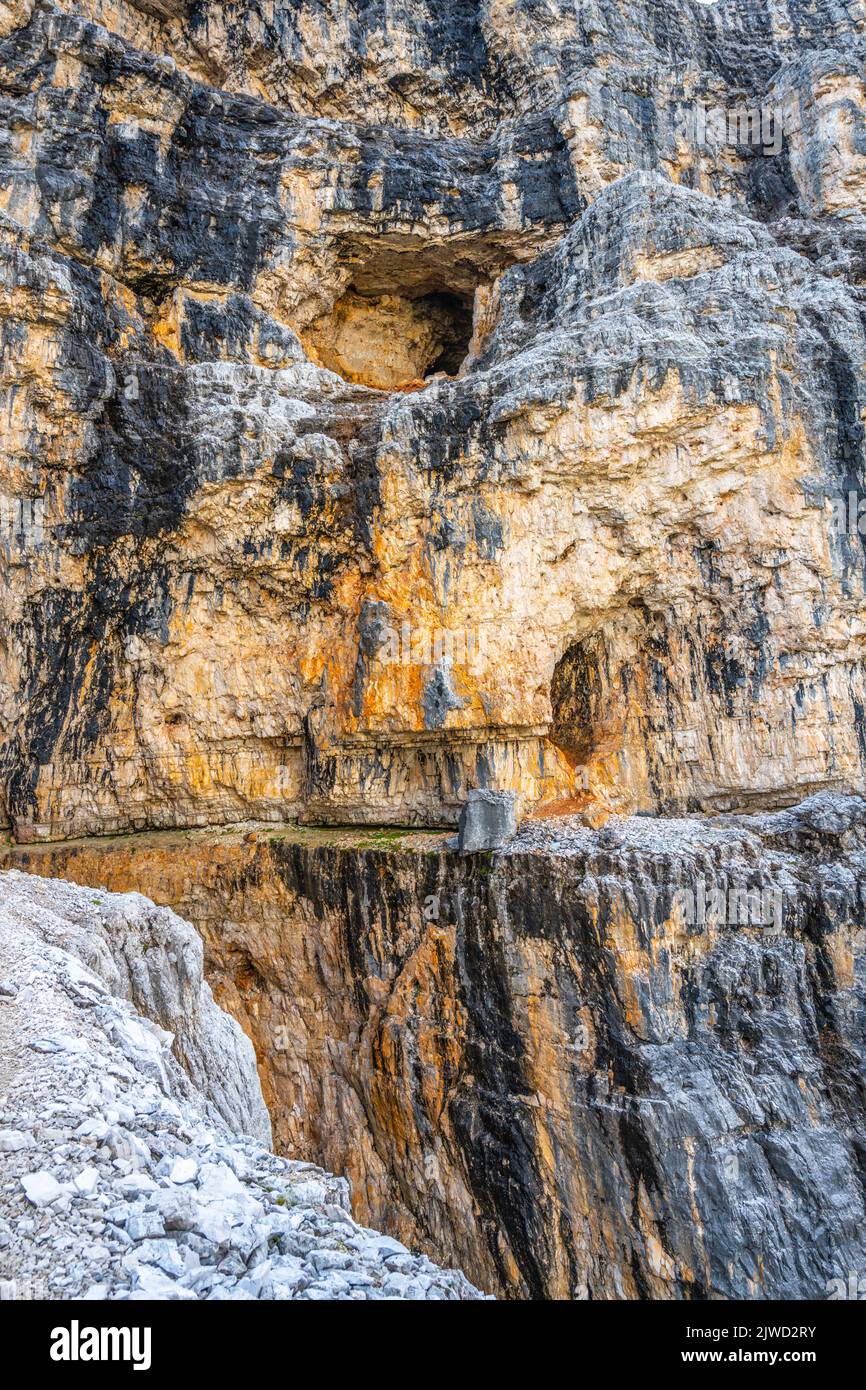 Tourist path in vertical wall of high mountain Stock Photo - Alamy