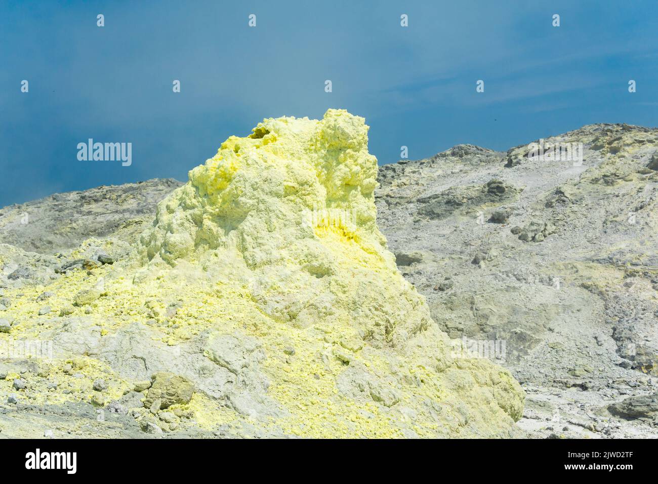 cone of sulfur deposits around a fumarole in a solfataric field against ...