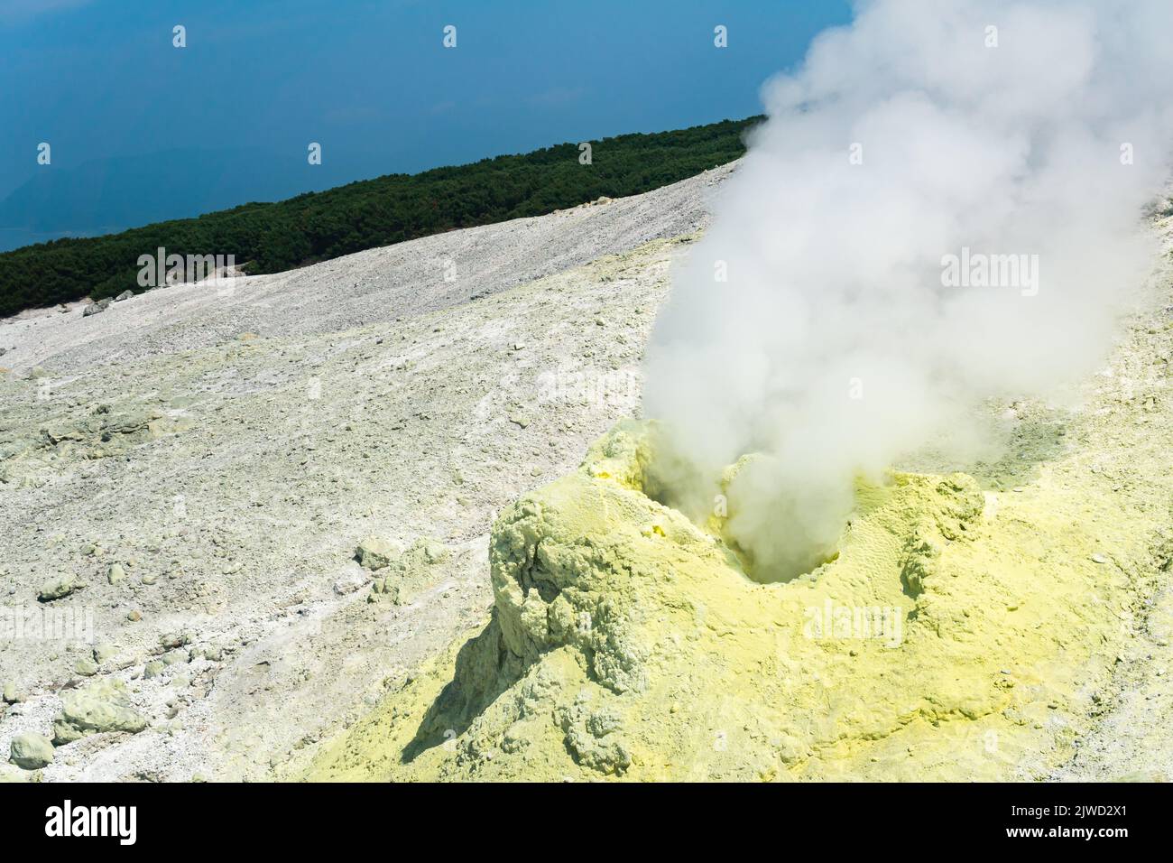 cone of sulfur deposits around a fumarole in a solfataric field ...