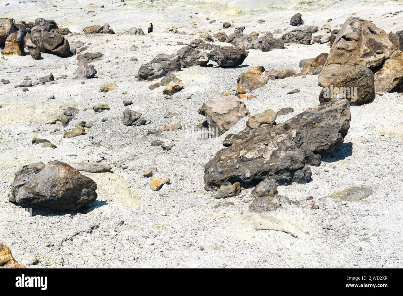 volcanic bombs among the tephra in a fumarole field on the slope of a ...