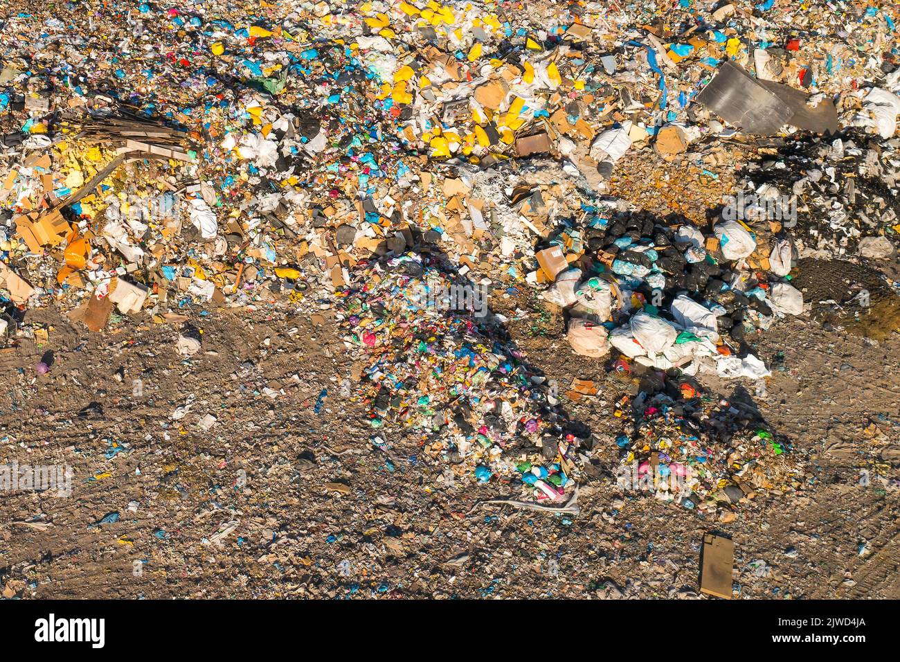Large garbage dump with plastic bags and trash in the country ...