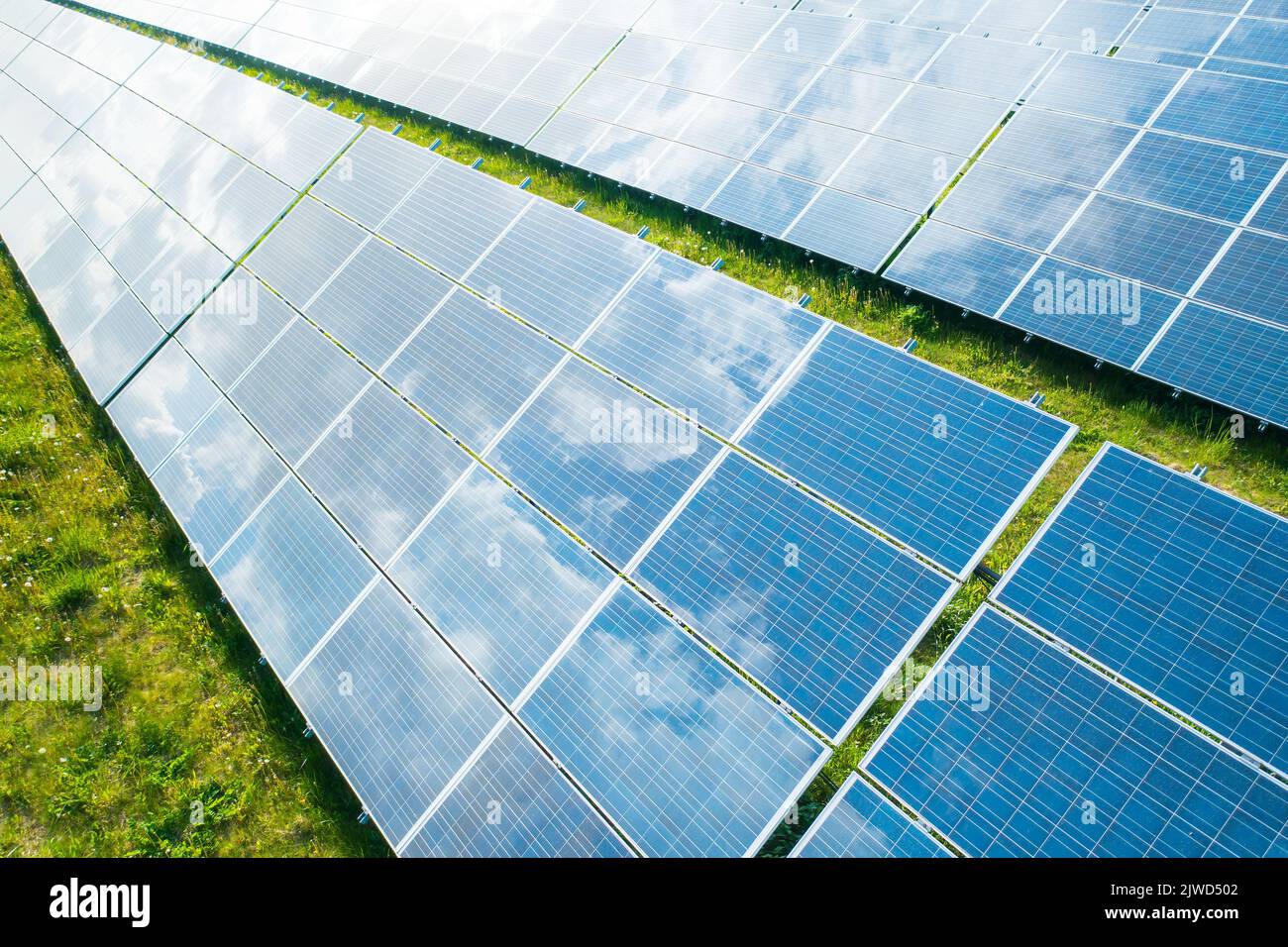 Solar panels in the green field for generation of green energy safety ...