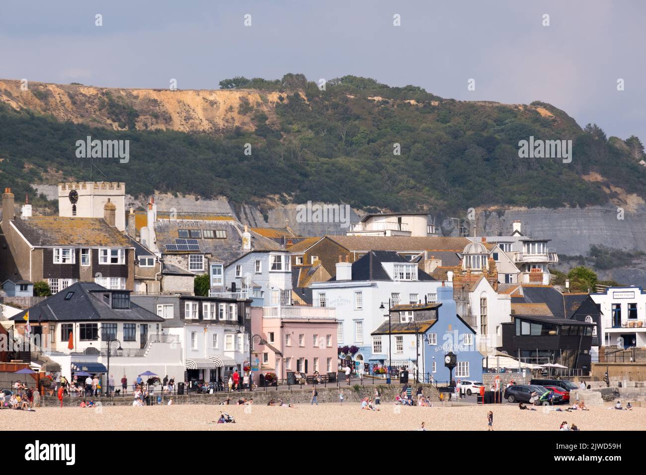 Summer beach lyme regis families hi-res stock photography and images ...
