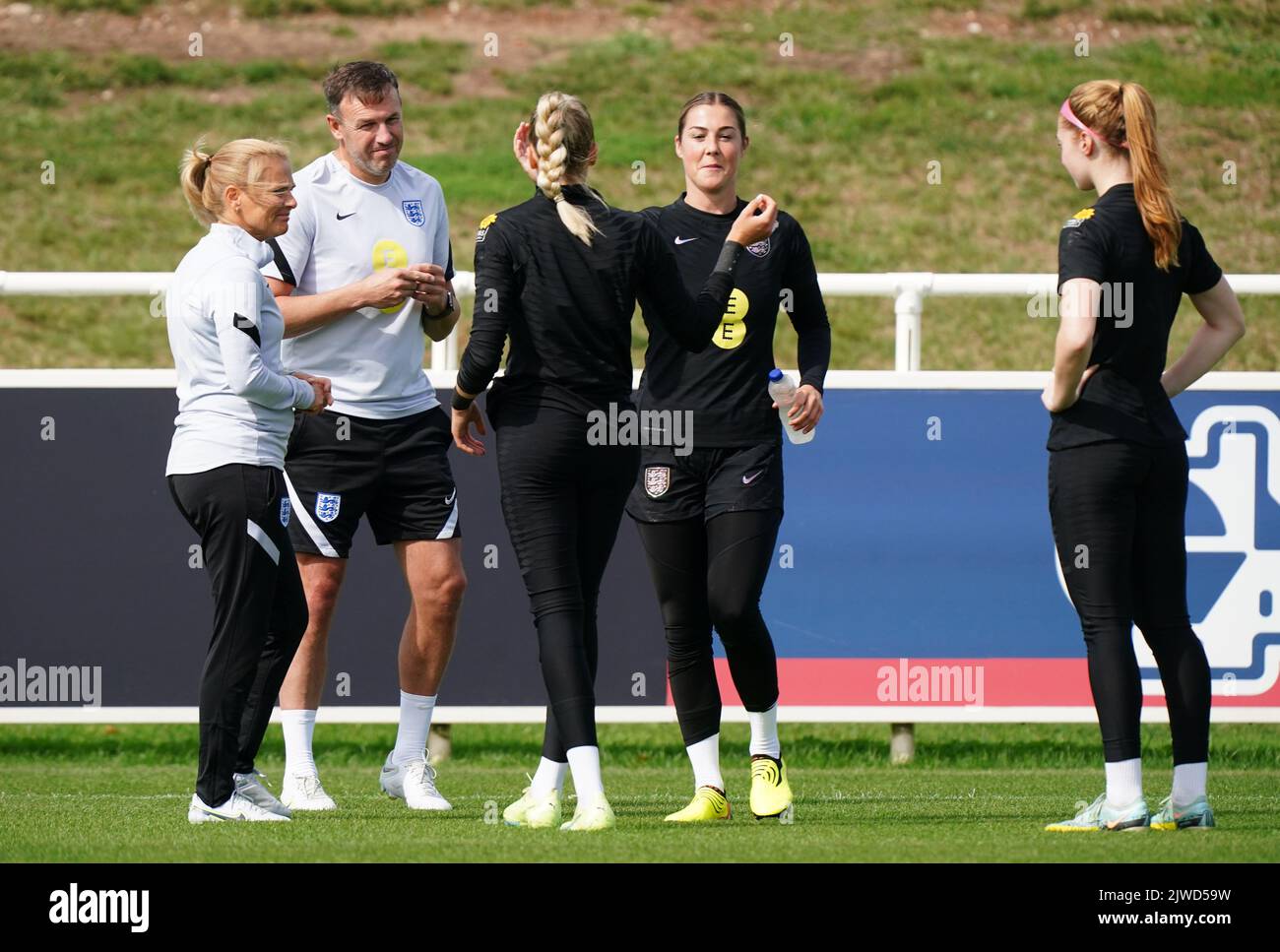 England head coach Sarina Wiegman (left) and goalkeeping coach Darren ...