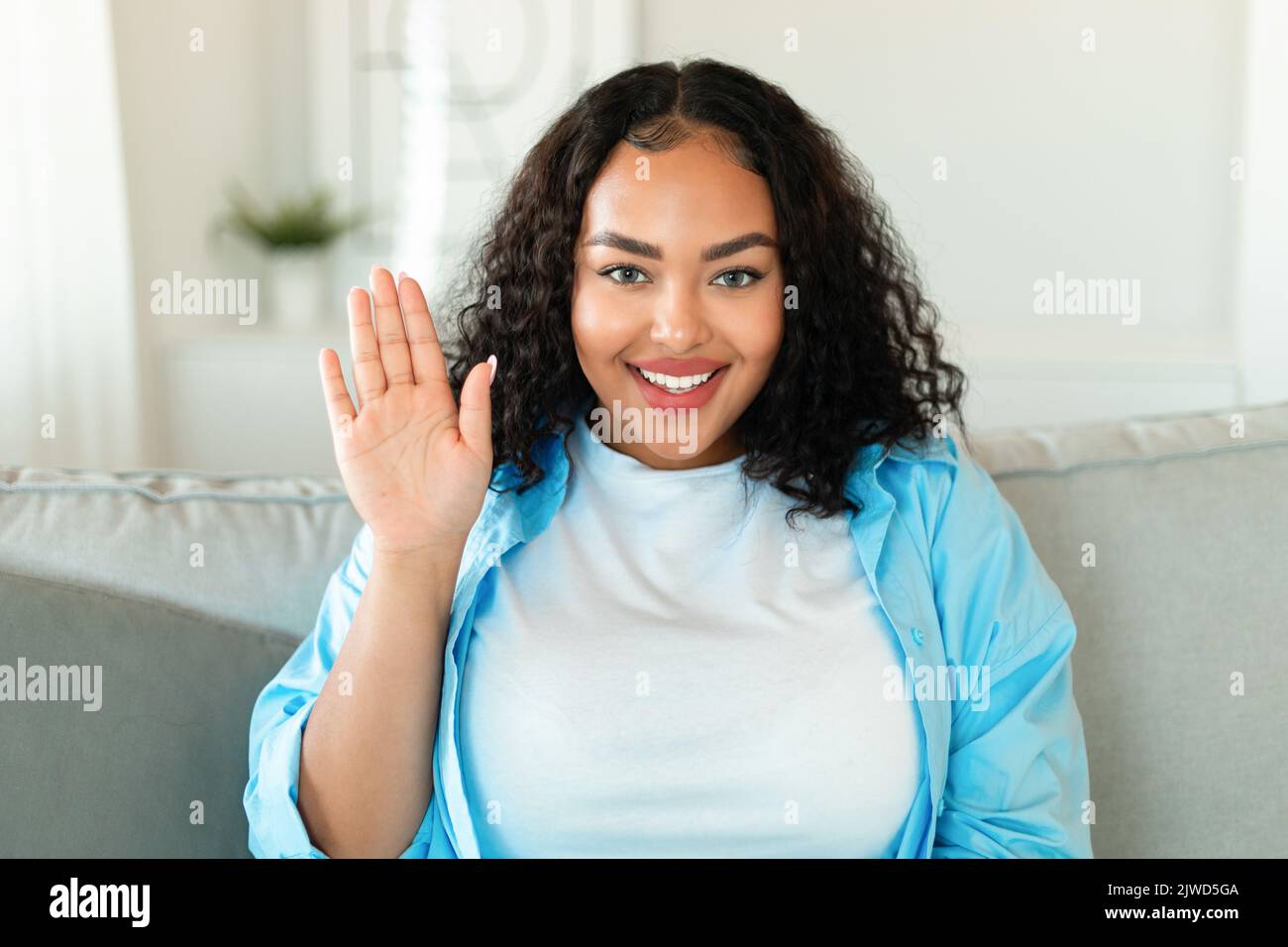 Female waving hand hi-res stock photography and images - Alamy