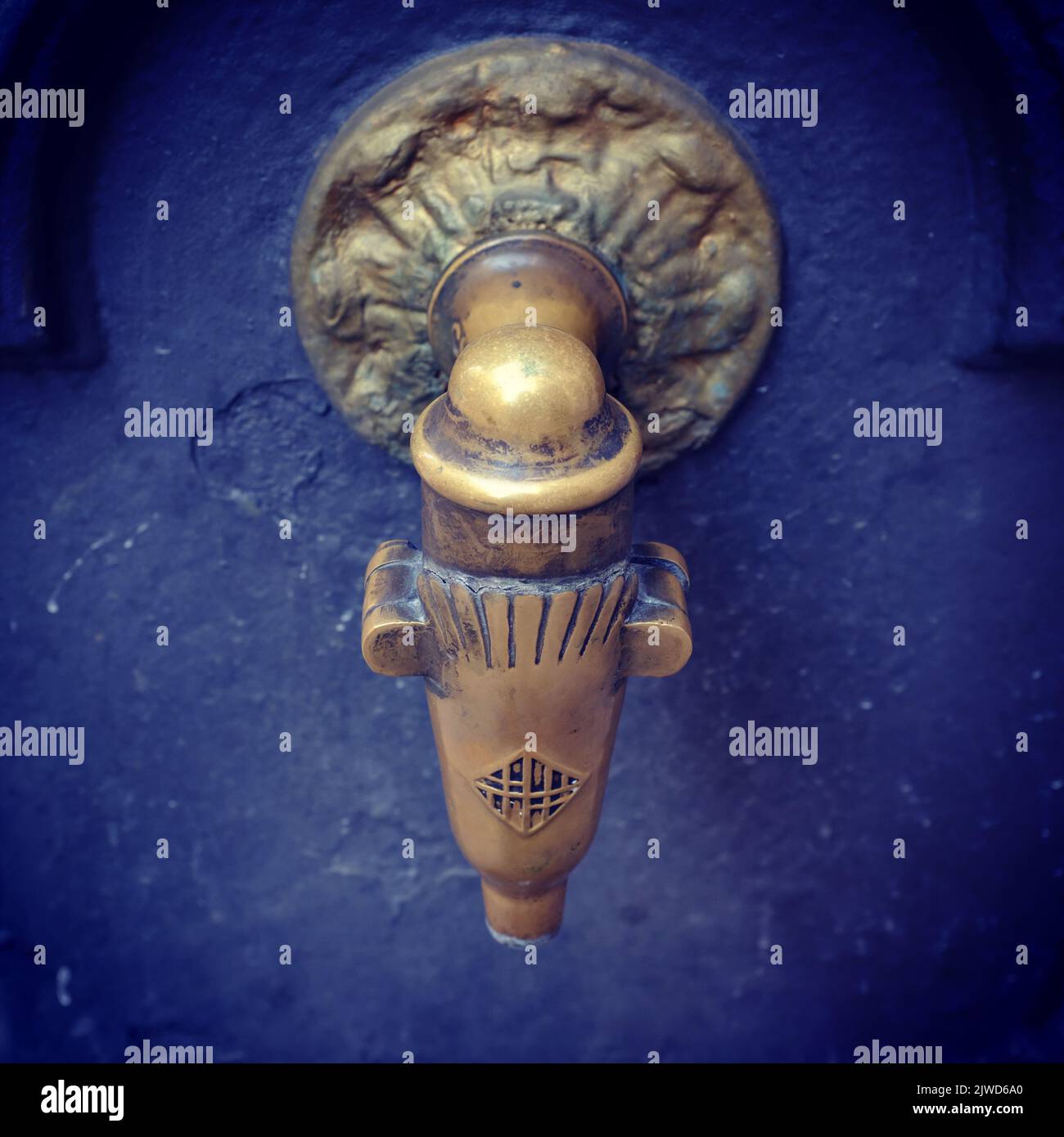 Beautiful old weathered vintage water fountain taps Stock Photo - Alamy