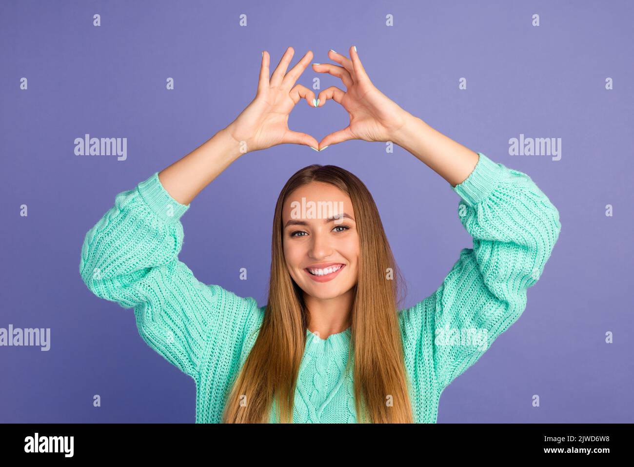 Portrait of charming lovely person hands fingers demonstrate heart ...