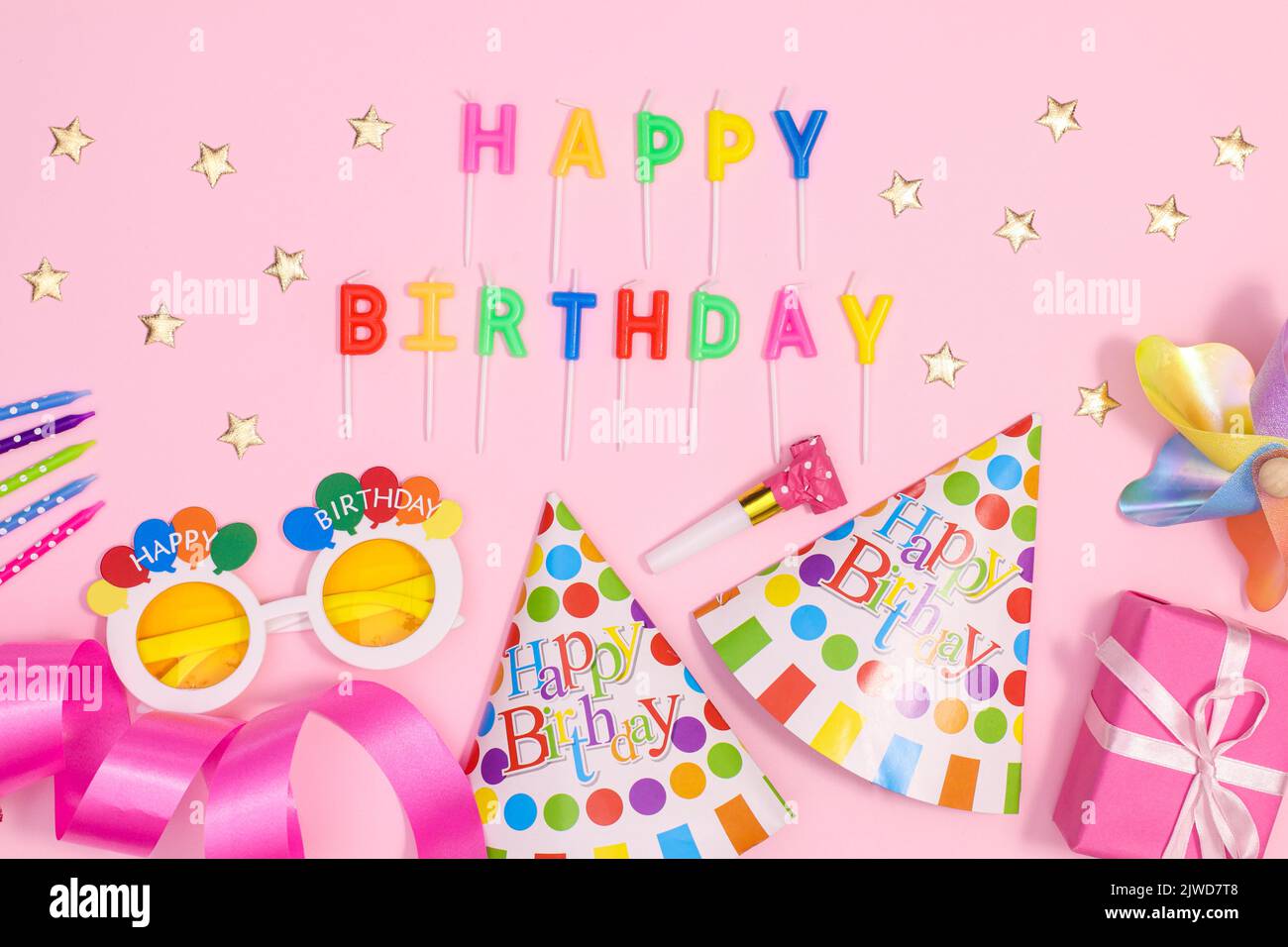 Birthday party background with party accessories on pastel pink theme ...